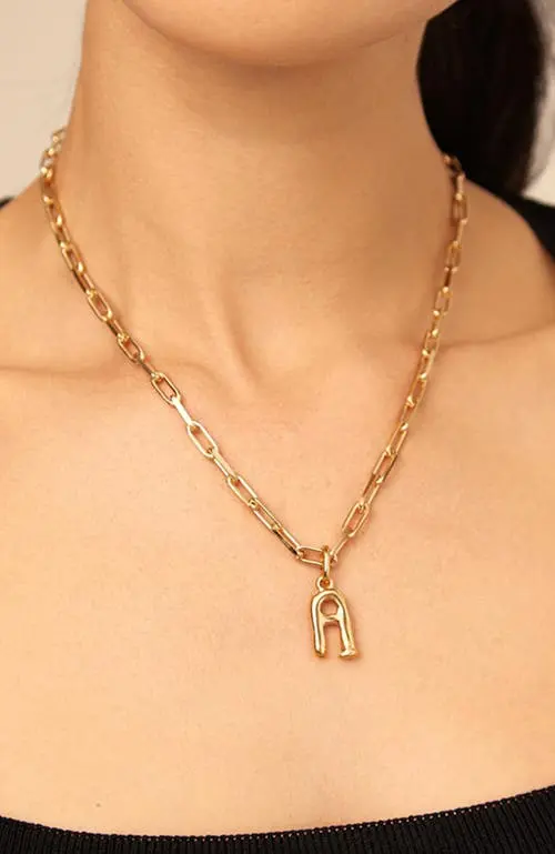 UNODE50 18k -plated Letter A Charm