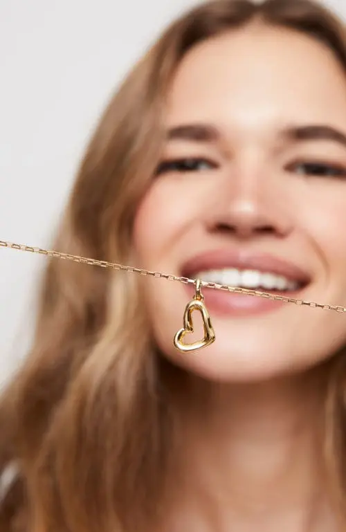 UNODE50 18k -plated Charm With Large Heart Shape