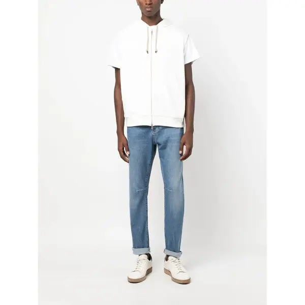 Brunello Cucinelli Tapered Leg Jeans With Logo Patch - Blue