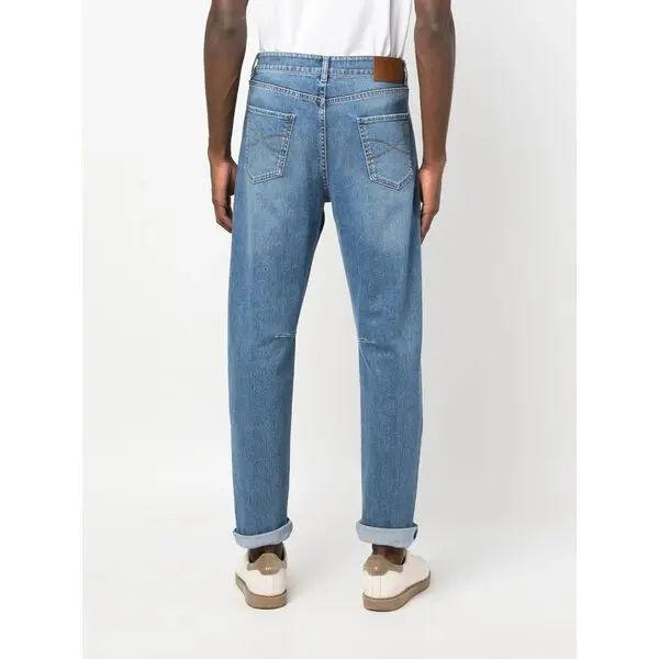 Brunello Cucinelli Tapered Leg Jeans With Logo Patch - Blue