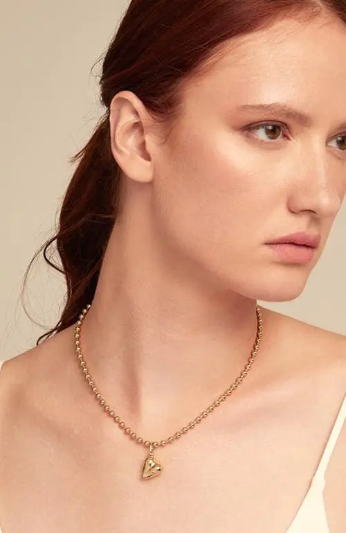 UNODE50 18k -plated Heart Shaped Charm