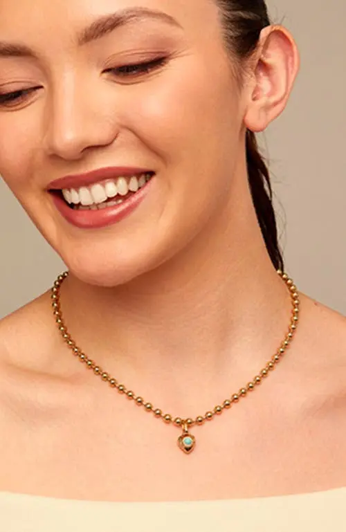 UNODE50 18k -plated Charm