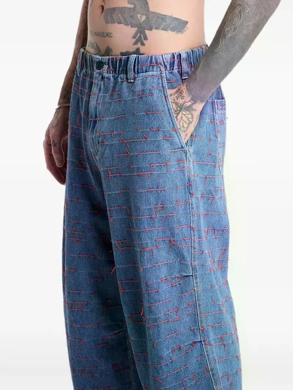 PLEASURES Strokes Parachute Pants