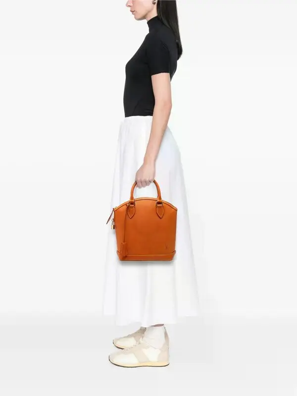 LOUIS VUITTON 2006 Nomade Lockit Vertical Handbag