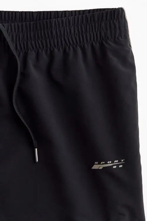 H&M Loose Fit Nylon Track Pants - Black/sport 92