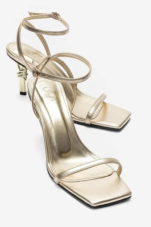 PROLOGUE SHOES Sone Stiletto Ankle Strap Sandal - Gold