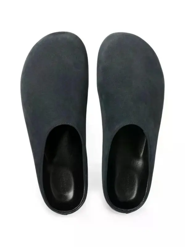 Studio Nicholson Wearing Leather Clogs