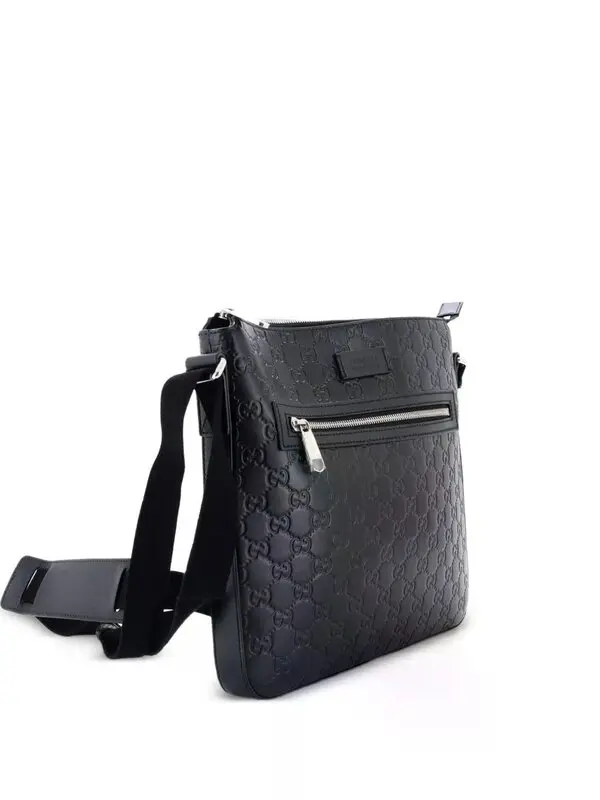Gucci Signature Embossed Leather Messenger Bag