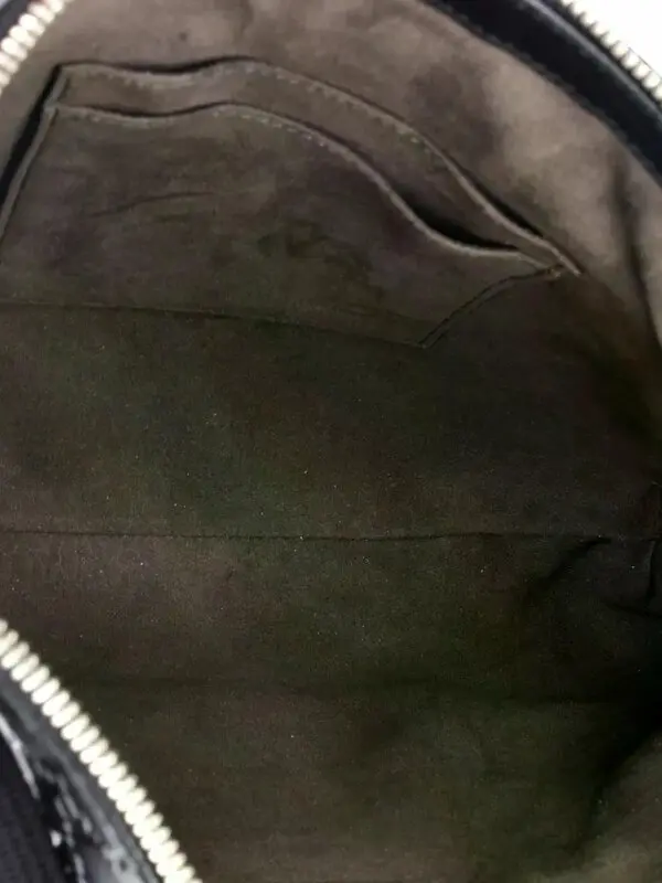 Gucci Signature Embossed Leather Messenger Bag