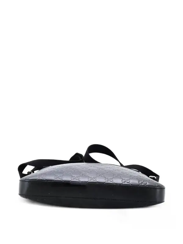 Gucci Signature Embossed Leather Messenger Bag