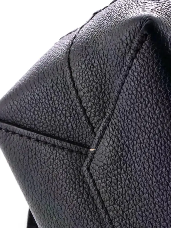 LOUIS VUITTON Lockme Leather Mini Backpack