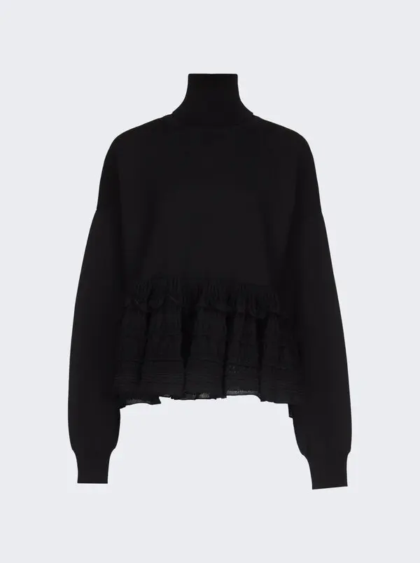 Alaïa Peplum Sweater