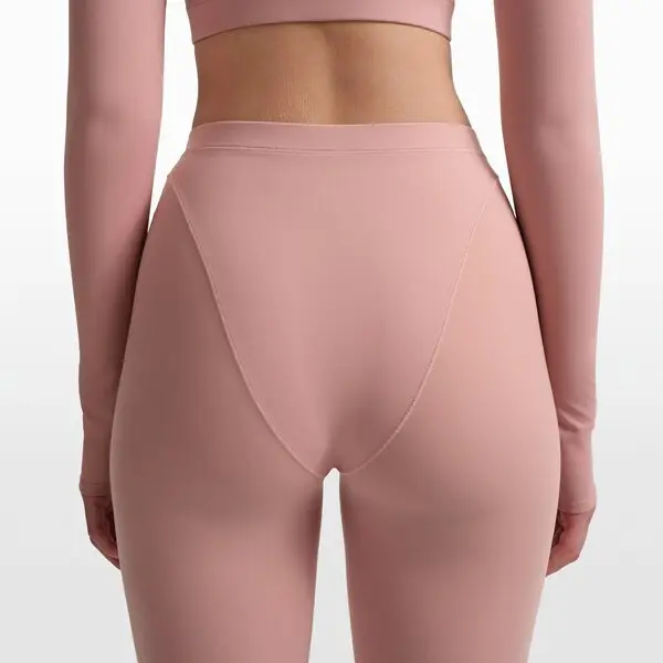 SKIMS V Panel 28" Legging | Pink | | Nike Weightless Layers