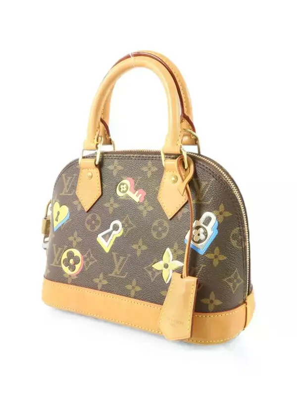LOUIS VUITTON Love Lock Alma Bb Tote Bag