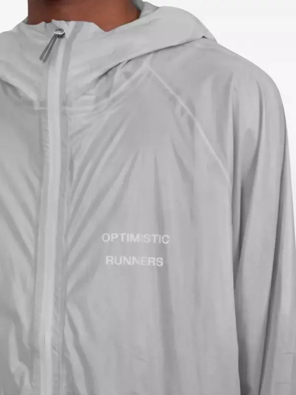 OPTIMISTIC RUNNERS Packable Hooded Jacket