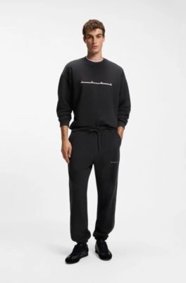 Hugo Relaxed-fit Cotton Jogger Pants With Streetwear Logo