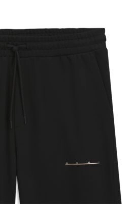 Hugo Relaxed-fit Cotton Jogger Pants With Streetwear Logo