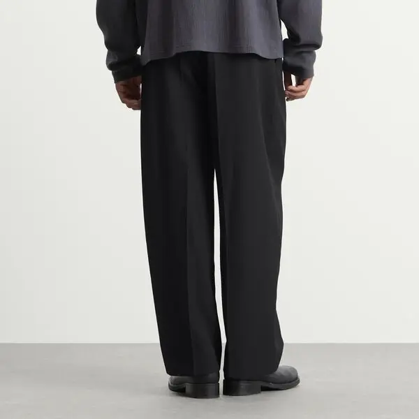 Studio Nicholson Line Tech Wool Pleated Trouser