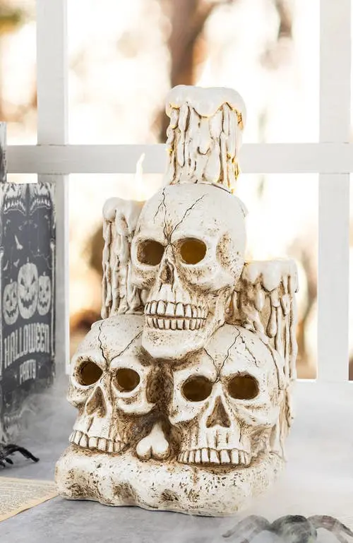 GLITZHOME Halloween Lighted Resin Reaper Skulls Candles Figurine - White