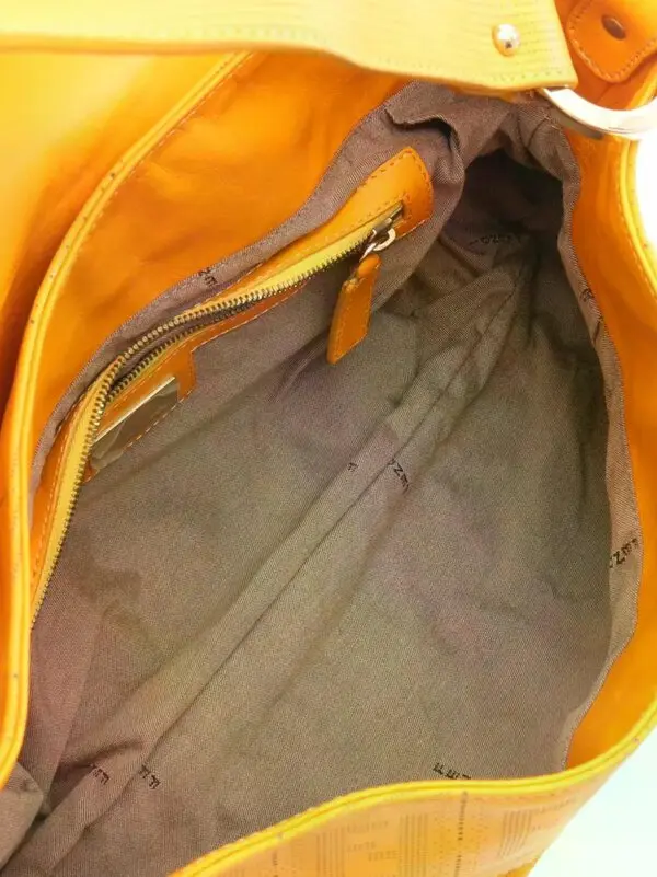 Fendi Zucca Perforated Leather Shoulder Bag - Orange
