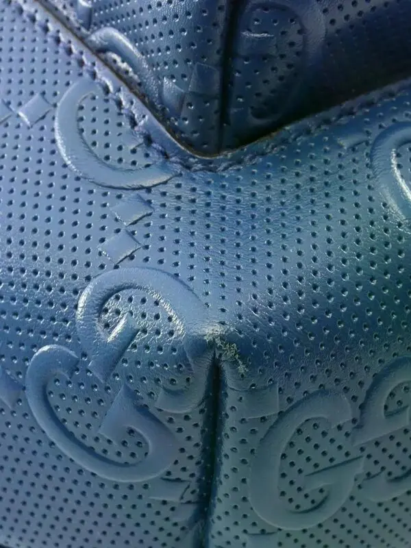 Gucci Leather Gg Embossed Belt Bag