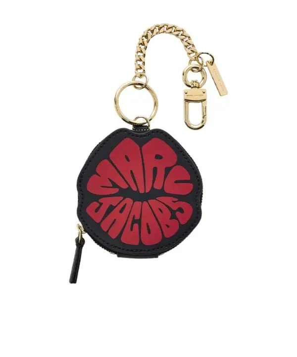 Marc Jacobs Holding A Key Case In Hand