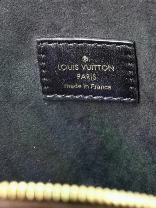 LOUIS VUITTON Monogram Canvas Toupie Handbag