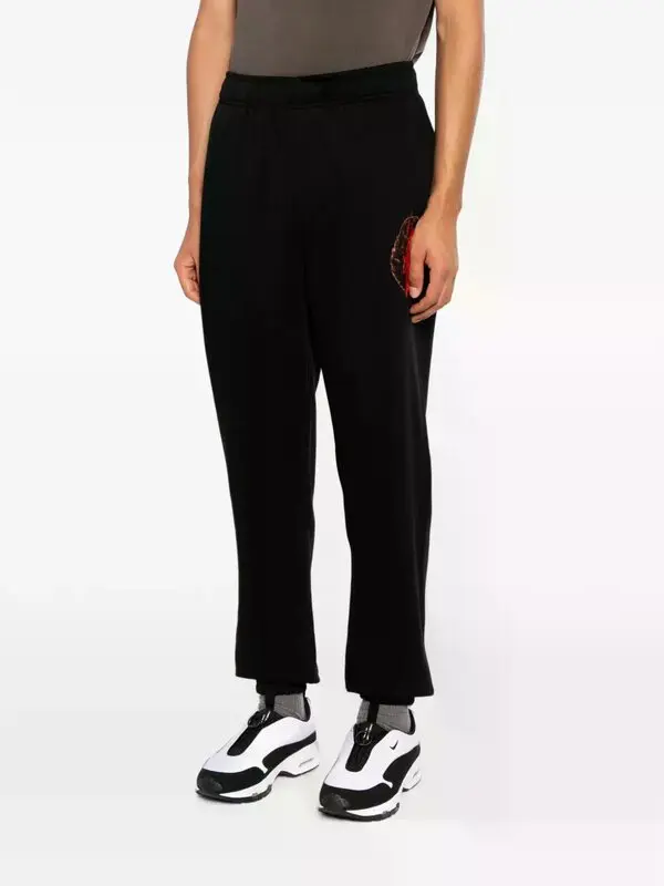 MELT Graphic-print Track Pants - Black