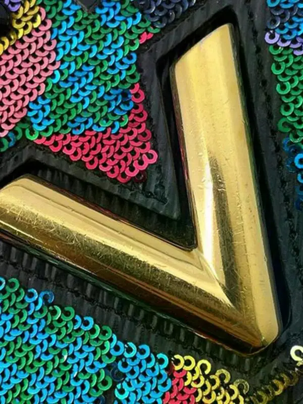 LOUIS VUITTON Sequin Bird Twist Clutch Bag