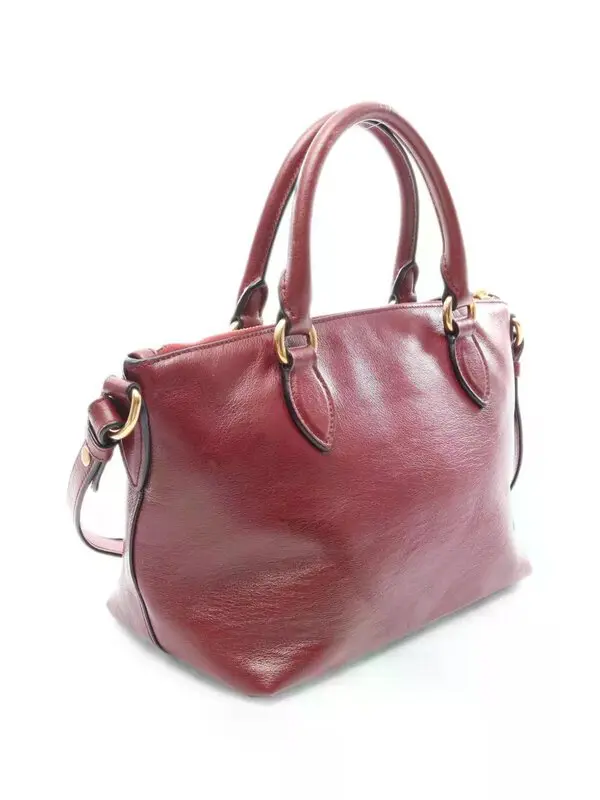Prada 2000s Logo-embossed Leather Handbag