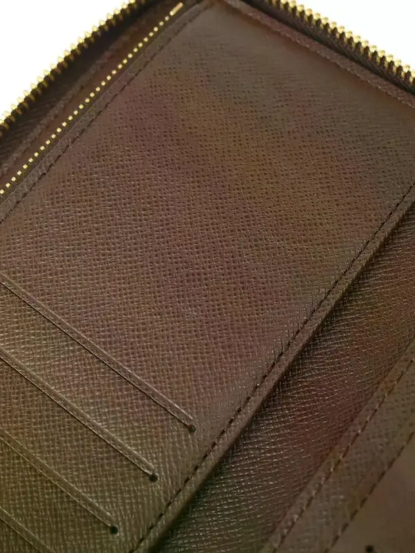 LOUIS VUITTON 2010 Damier Ebène Zippy Wallet