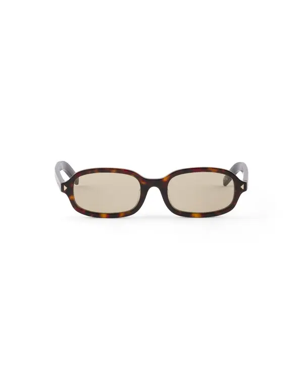 Prada Sunglasses With The Iconic Metal Plaque