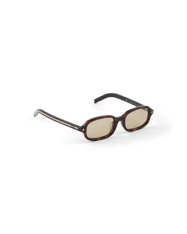 Prada Sunglasses With The Iconic Metal Plaque