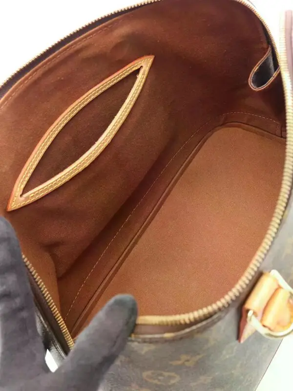 LOUIS VUITTON 1997 Monogram Alma Pm Handbag
