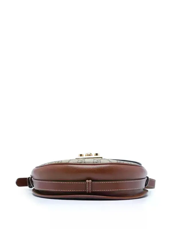Gucci Gg Supreme Saddle Padlock Crossbody Bag - Neutrals