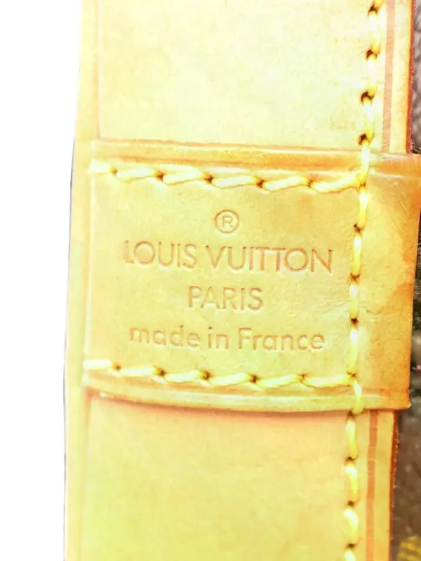 LOUIS VUITTON Monogram Alma Handbag