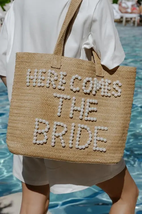 UNTAMED PETALS Here Comes The Bride" Pearl Embellished Straw Tote