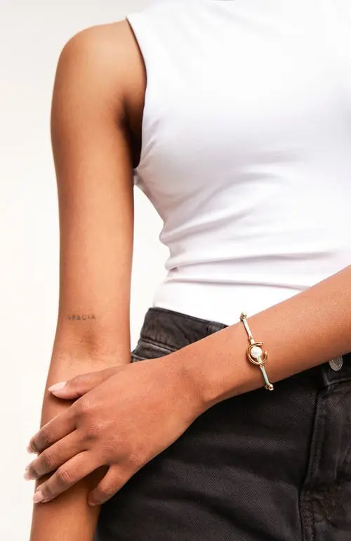 UNODE50 Blue Silk-style Thread Bracelet With Pearl Detail