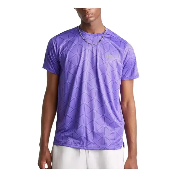 NEW BALANCE Sport Essential Printed T-shirt Asia Sizing - Purple