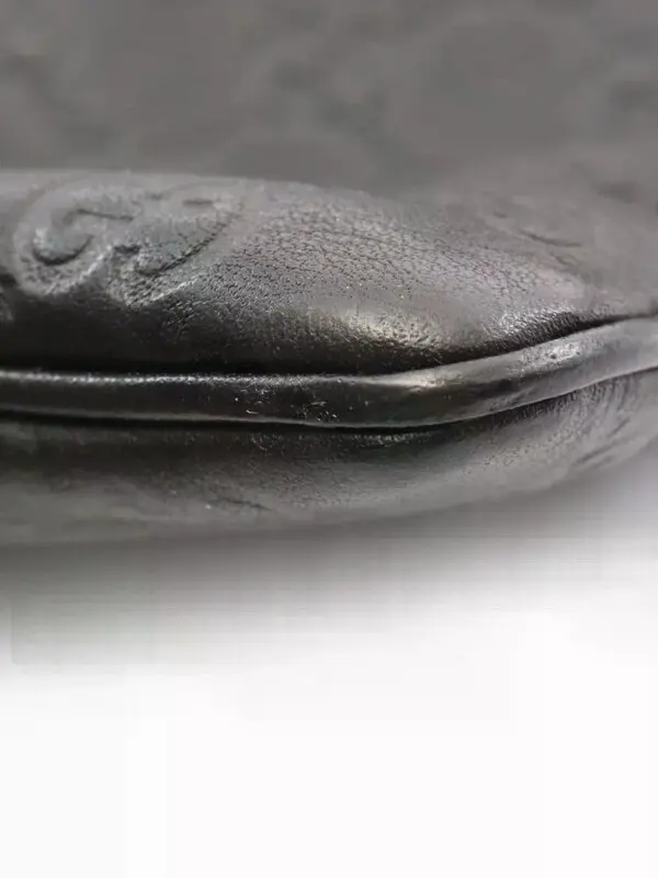 Gucci Debossed Guccissima Leather Messenger Bag