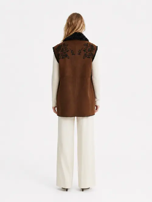 MINE BILGI Cadenza Merino Curly Shearling Long Vest With Embroidery