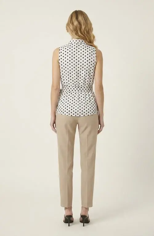 MODENAIRE Sleeveless Polka Dot Drape Neck Waist Tie Blouse