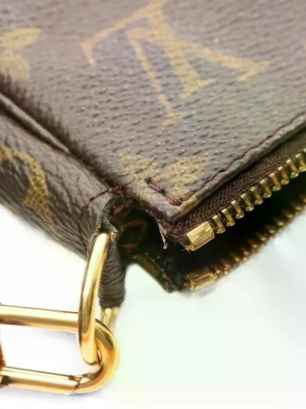 LOUIS VUITTON Monogram Pochette Accessoires Handbag - Brown