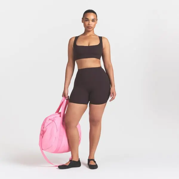 SKIMS Racerback Bra | Deep Neutral | | Nike Studio Stretch - Dark Roast