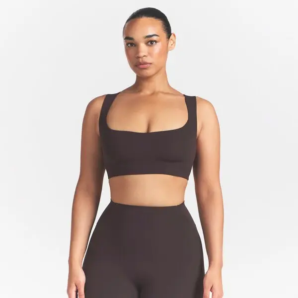 SKIMS Racerback Bra | Deep Neutral | | Nike Studio Stretch - Dark Roast