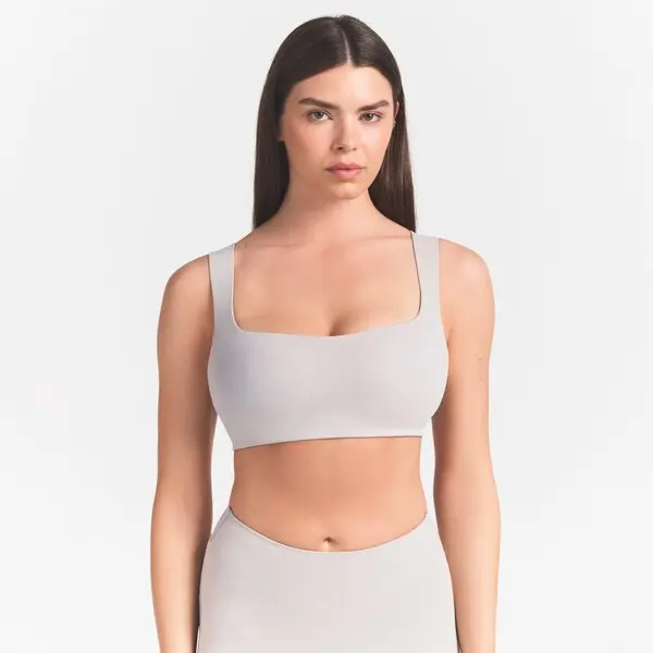 SKIMS Racerback Bra | White | | Nike Studio Stretch