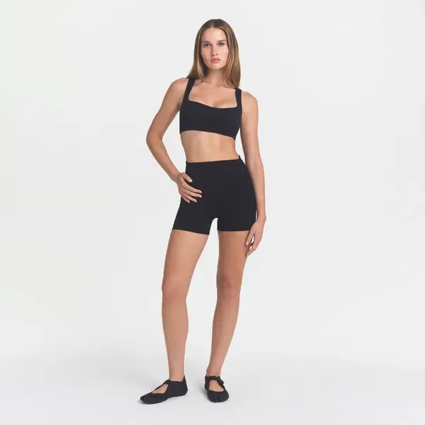 SKIMS Racerback Bra | Black | | Nike Studio Stretch