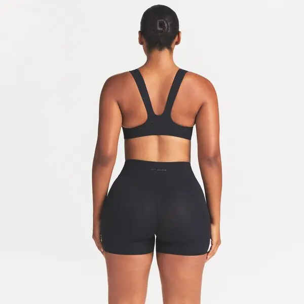 SKIMS Racerback Bra | Black | | Nike Studio Stretch - Obsidian