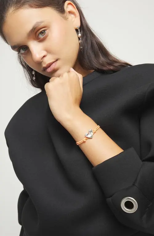 UNODE50 Sterling Silver Plated Elastic Cord Bracelet With Heart Charm - Orange