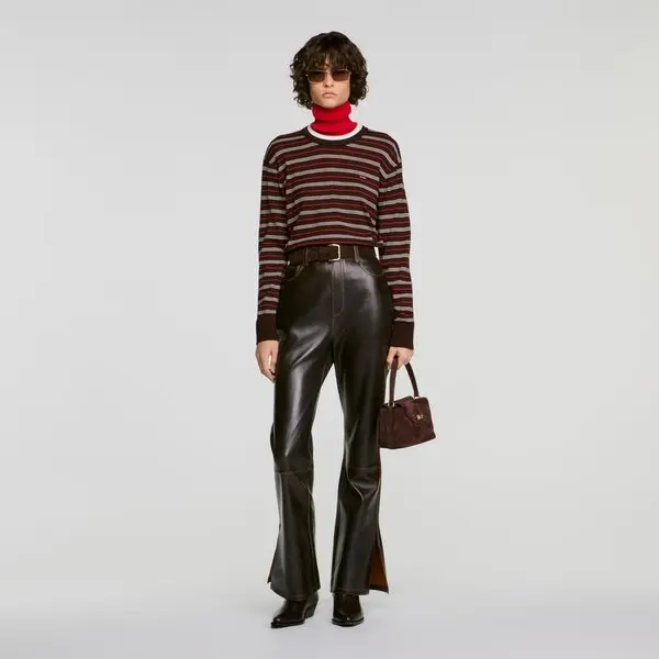 Sandro Distressed Leather Flared Trousers With Hem Slits
